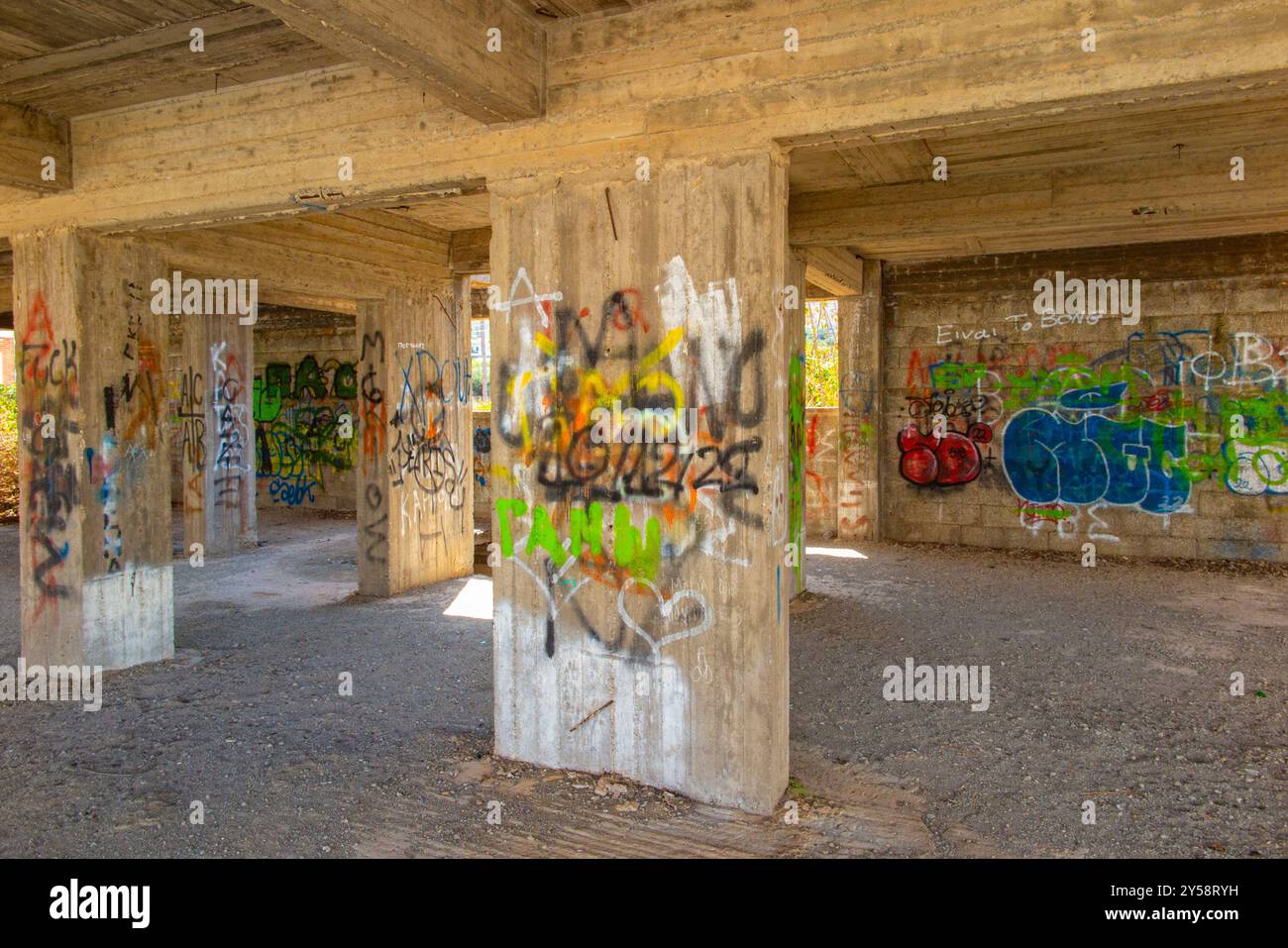 An abandoned industrial building with graffiti tags Stock Photo - Alamy