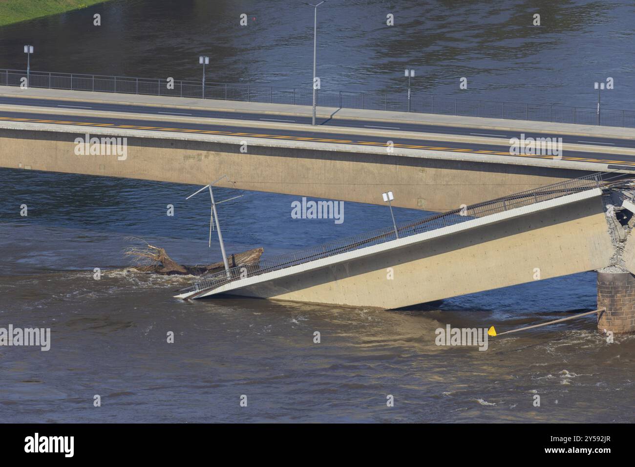 In the early hours of the morning, a section of the Carola Bridge ...