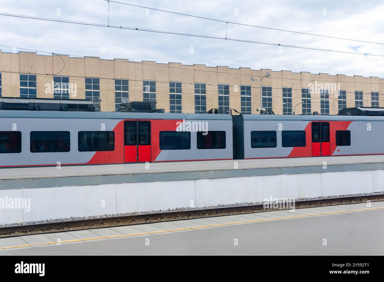 suburban electric train stands on the station Stock Photo - Alamy