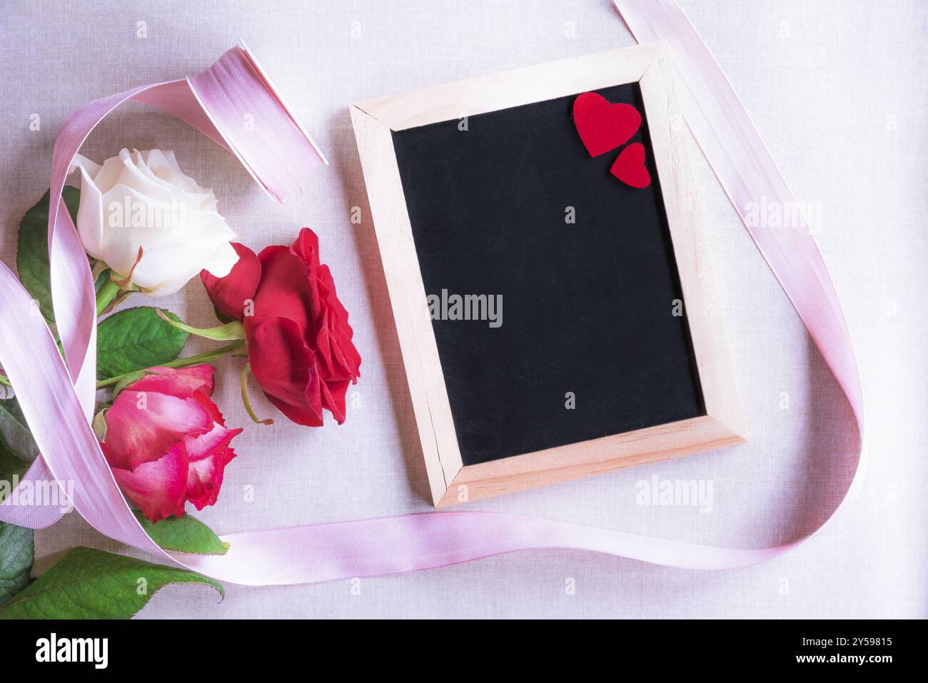 Valentine day theme image with beautiful roses tied with pink ribbon ...