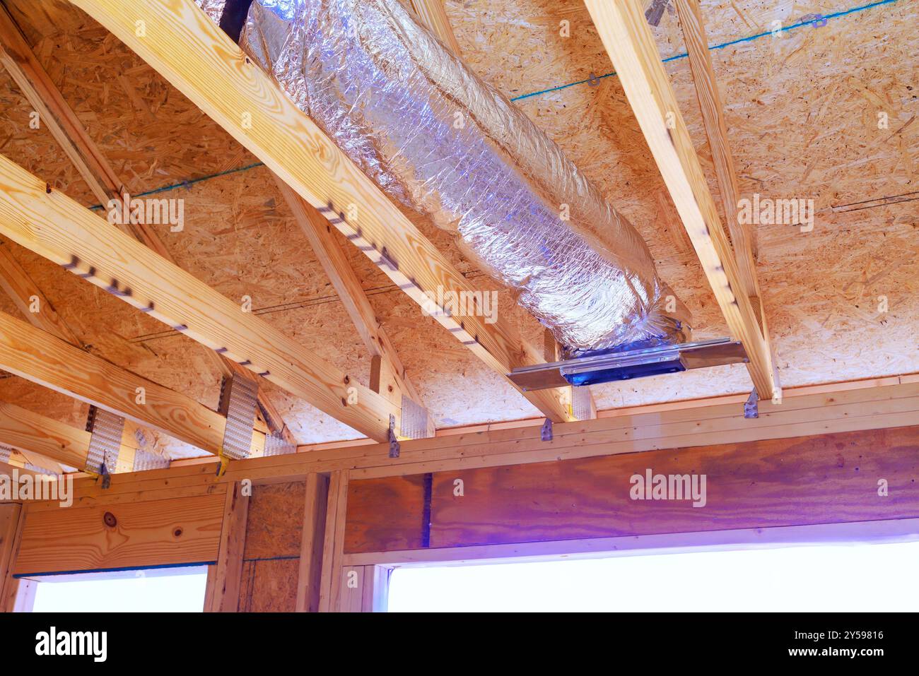 Construction process silver insulation ventilation HVAC pipes are ...