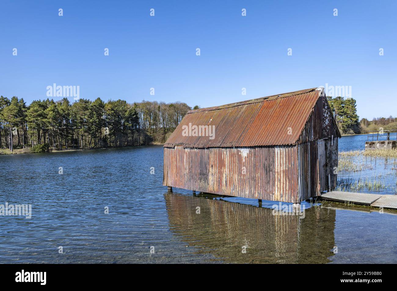 Rusty old Boathouse on Lindean Reservoir and nature reserve in the ...