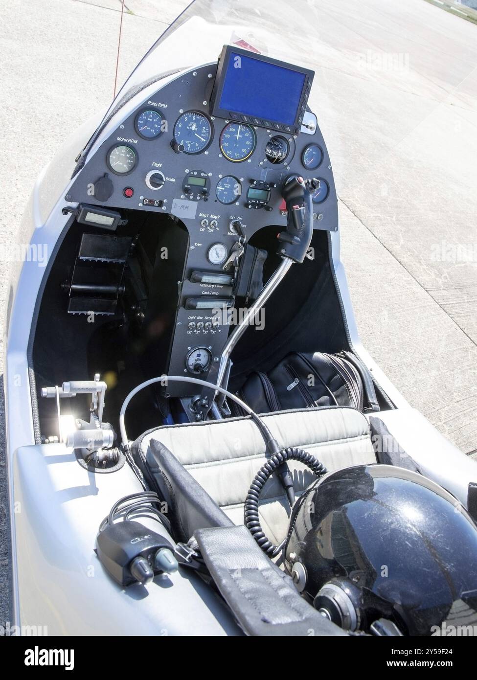 Cockpit of a gyrocopter with an aviator helmet on the seat Stock Photo ...