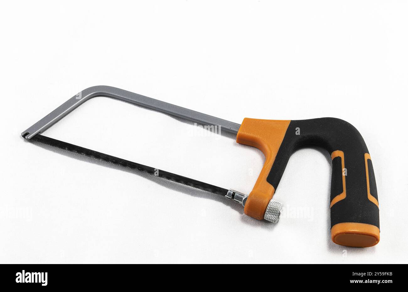 Hack saw on a white background Stock Photo - Alamy
