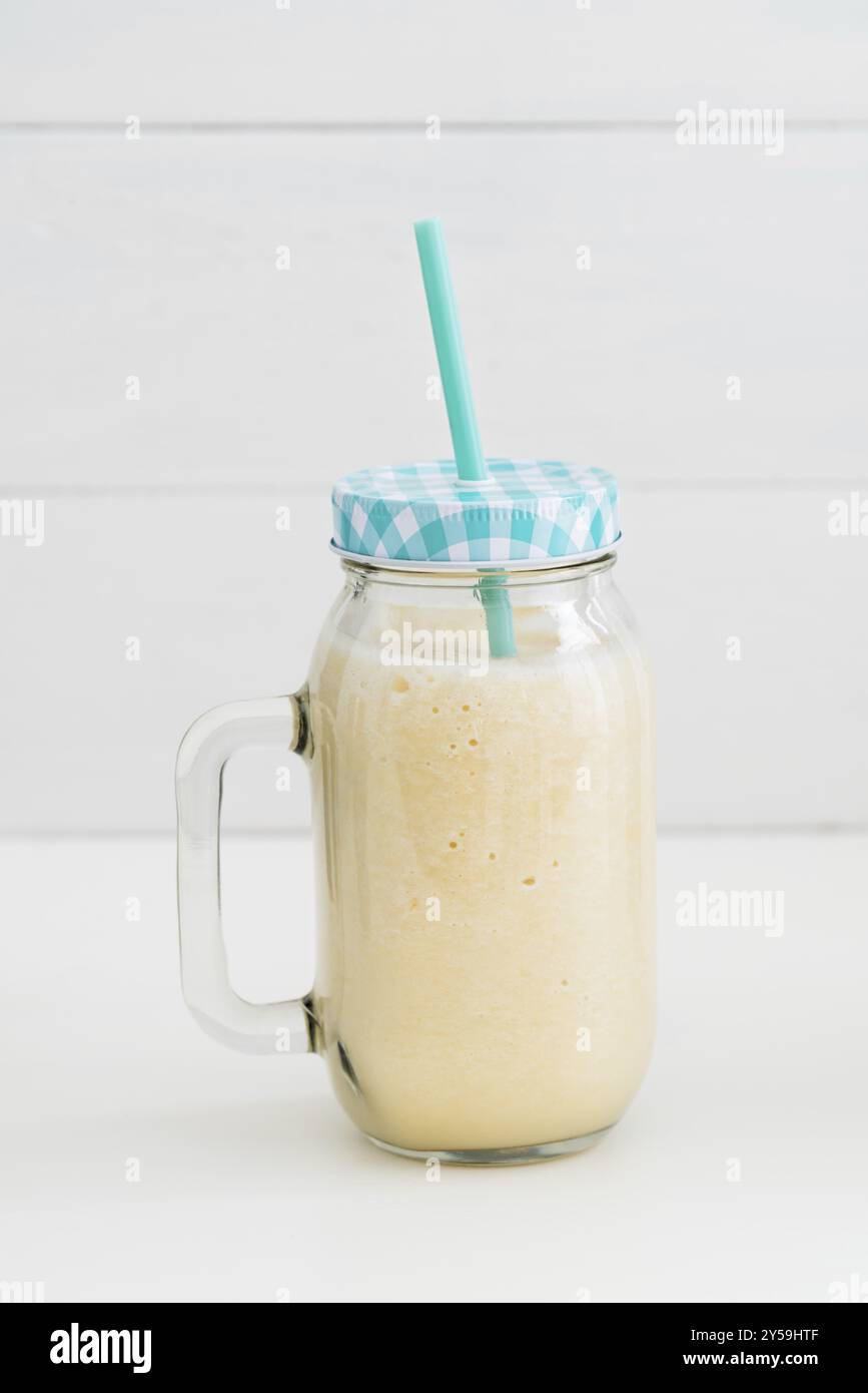 Healthy orange smoothie with fruit and yogurt Stock Photo - Alamy