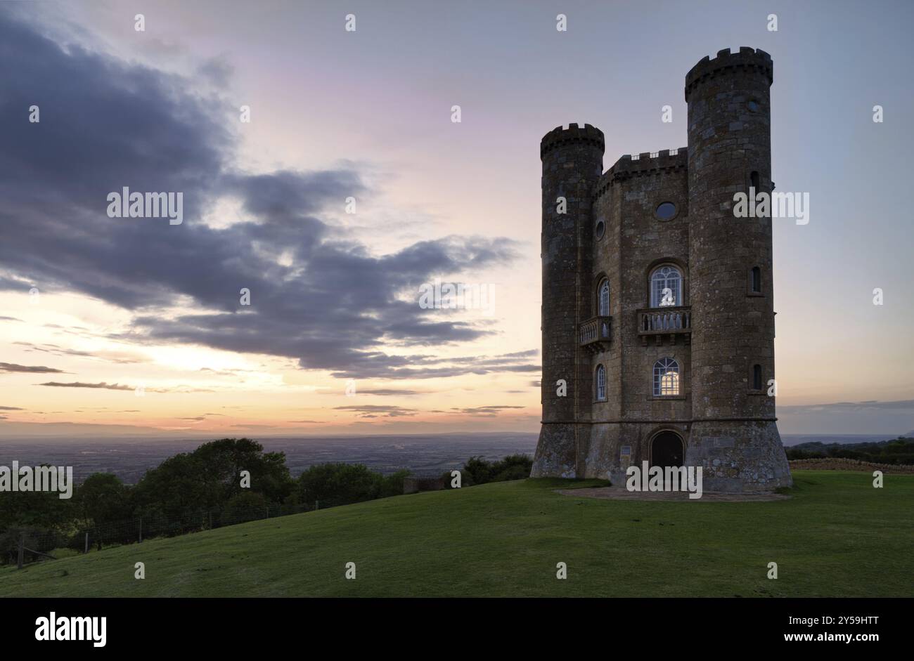 Broadway Tower with valley view after sunset Cotswolds, UK Stock Photo ...