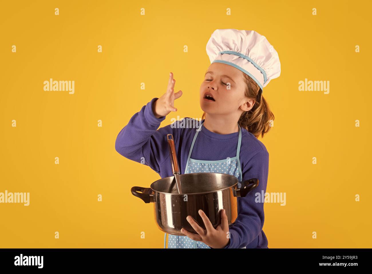 Kid cook with cooking pot and ladle. Kid in cooker uniform and chef hat ...
