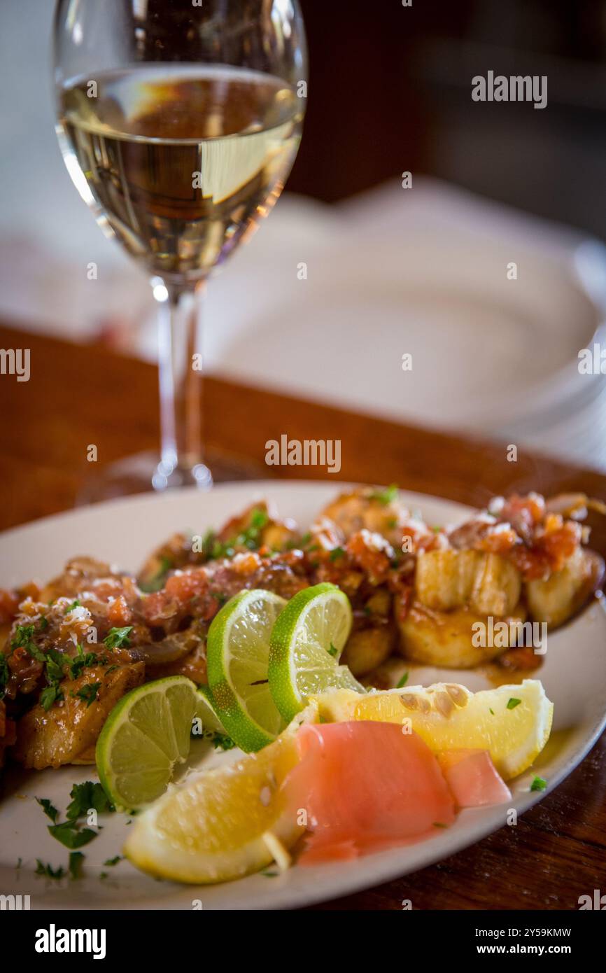 Seared Scallops Covered with Pico De Gallo Stock Photo - Alamy