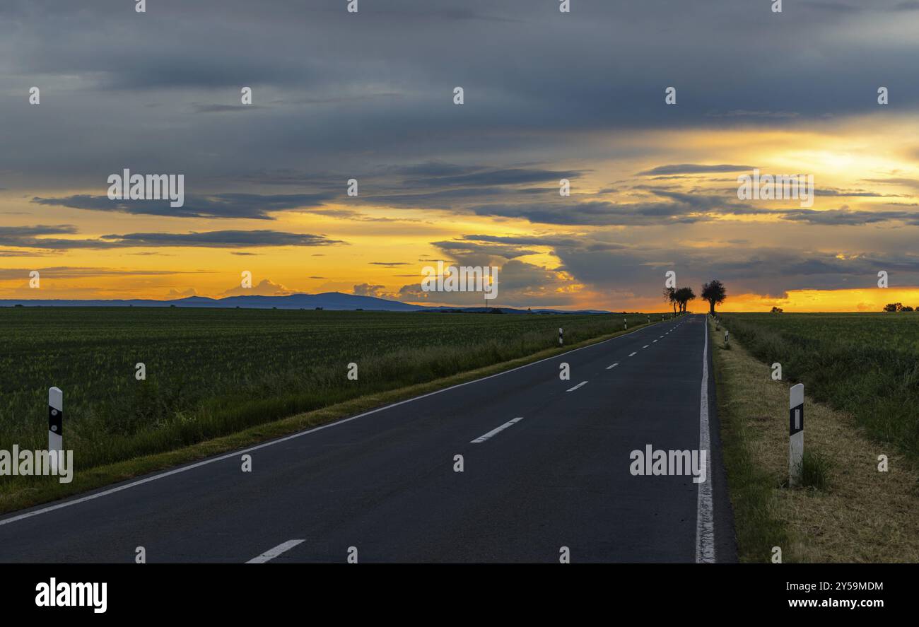 Sunset time road hi-res stock photography and images - Alamy