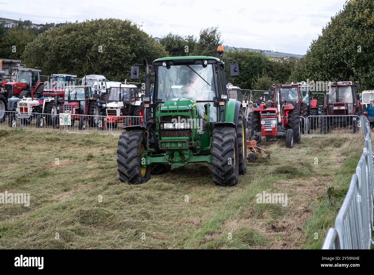 A John Deere tractor with hay bob, part of a tractor exhibition at the ...