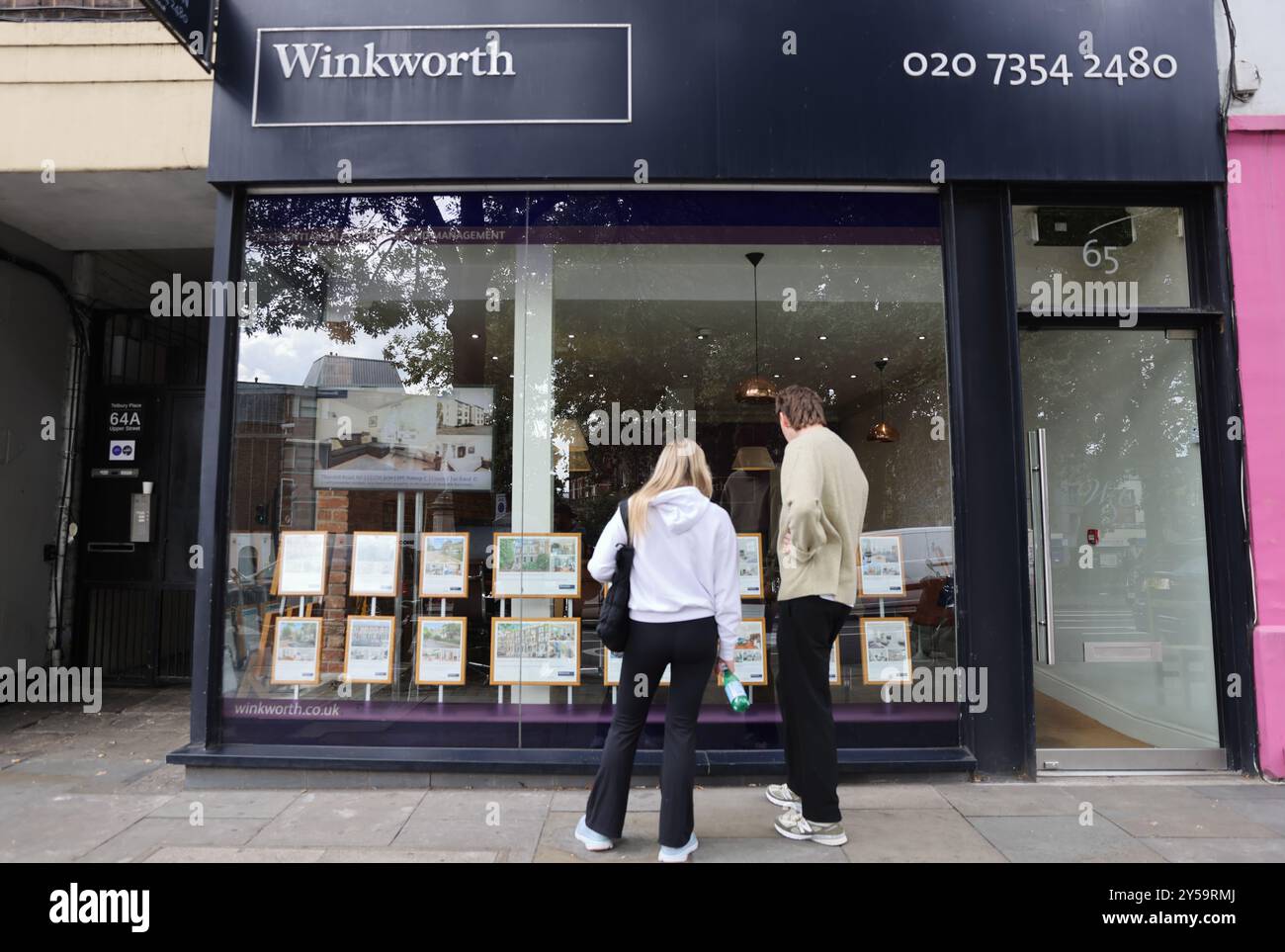 Estate agent windows in islington, north London, UK Stock Photo - Alamy