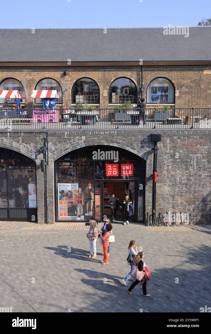 The UNIQLO store in Coal Drops Yard at Kings Cross, north London, UK ...