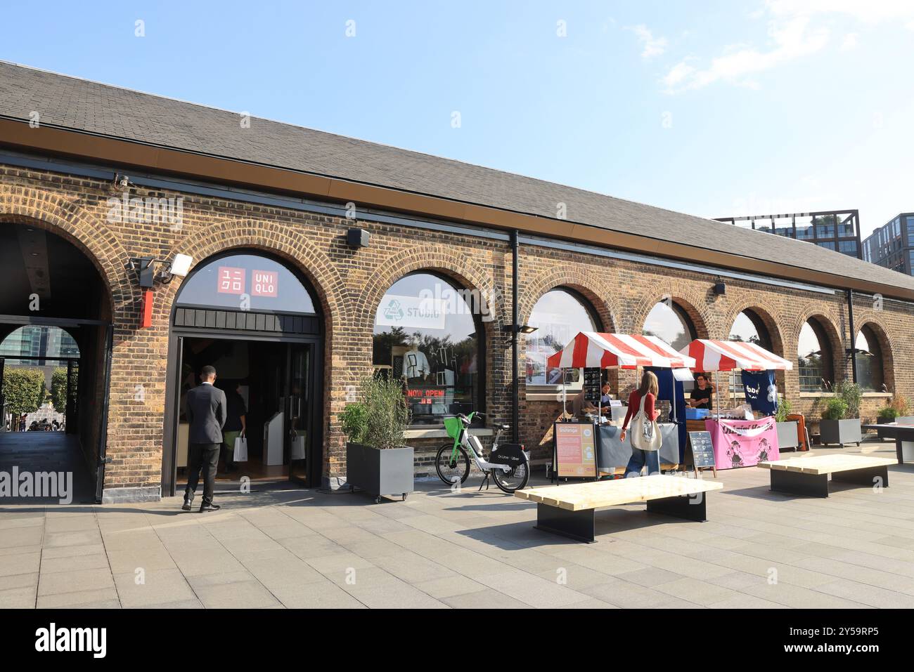 The UNIQLO store in Coal Drops Yard at Kings Cross, north London, UK ...