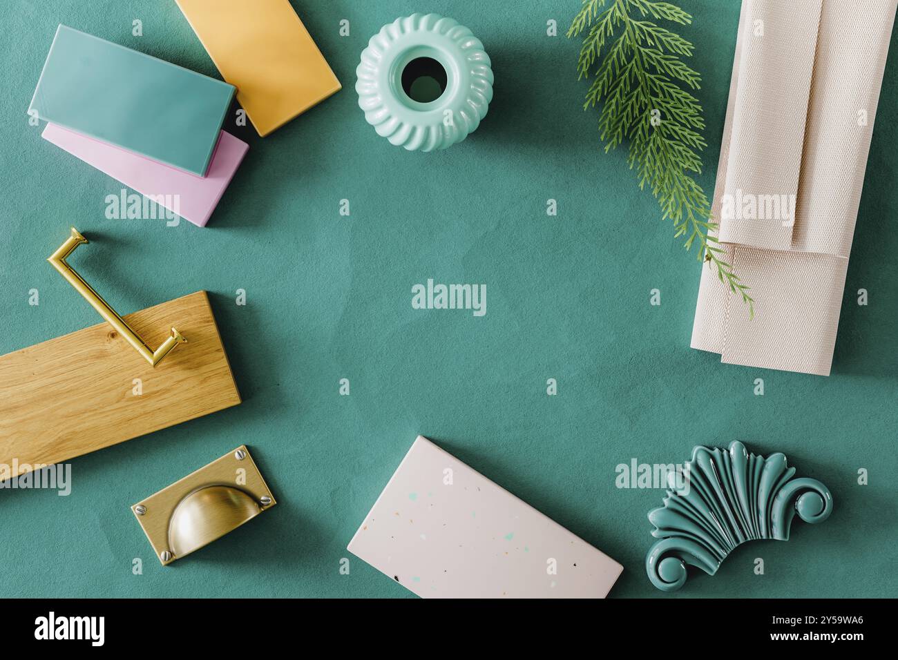 Flat lay of material samples for interior design on turquoise paper ...