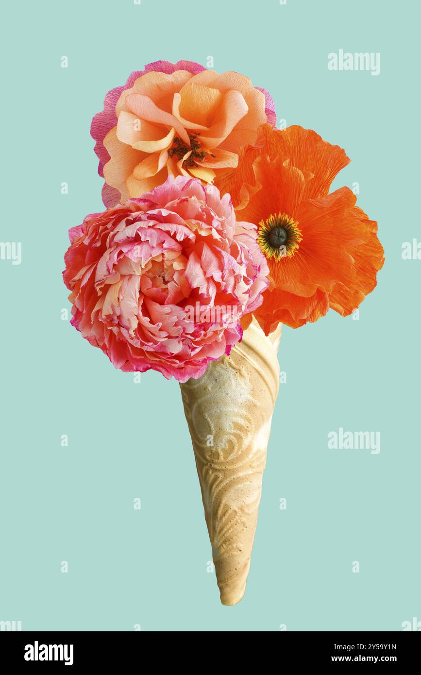 Ice cream cone filled with handmade crepe paper flowers isolated on ...