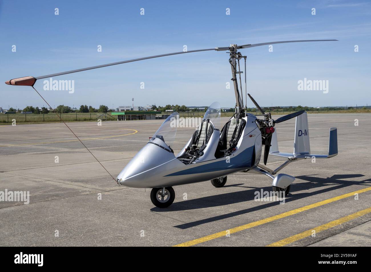 Side view of a gyroplane on an airfield with secured rotor Stock Photo ...