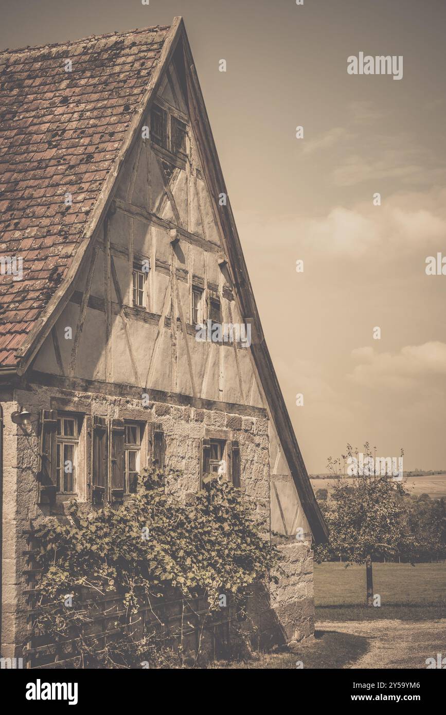 Retro style image of an antique german house with traditional ...