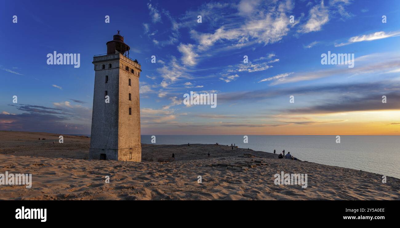 The Rubjerg Knude Fyr lighthouse near Lokken in Denmark in the light of ...