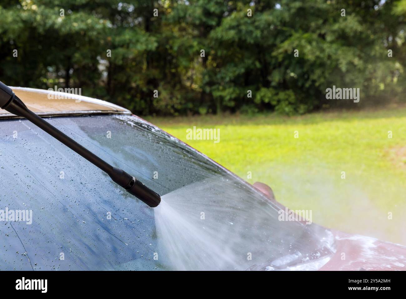 Outdoor car washing with high pressure water jet Stock Photo - Alamy