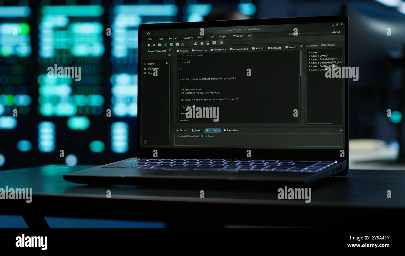 Focus On Laptop Used By Engineers Coding In Modern Data Center