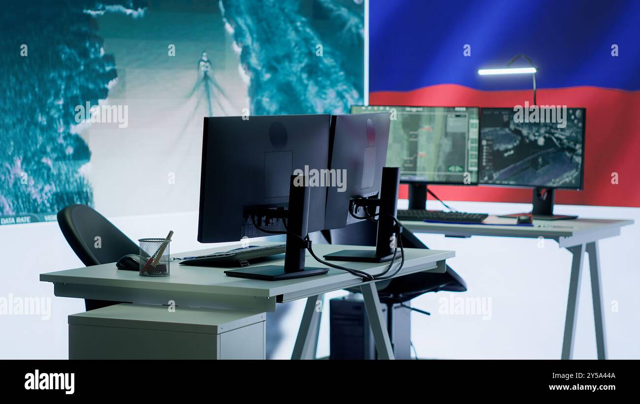 Empty army command post with the russian flag running on big screen ...