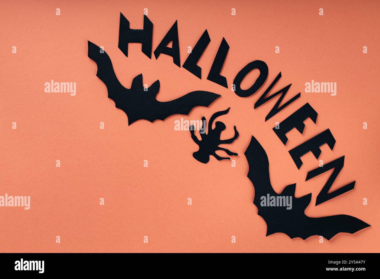 DIY Halloween Bat and Spider Paper Cutouts with Halloween Lettering on ...