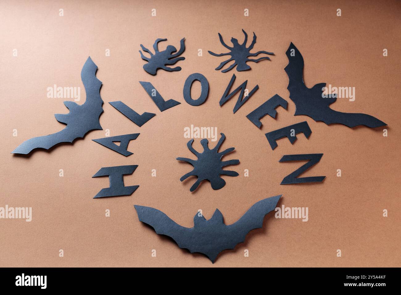 Handmade Halloween Paper Cutouts of Bats and Spiders for Eerie Holiday ...