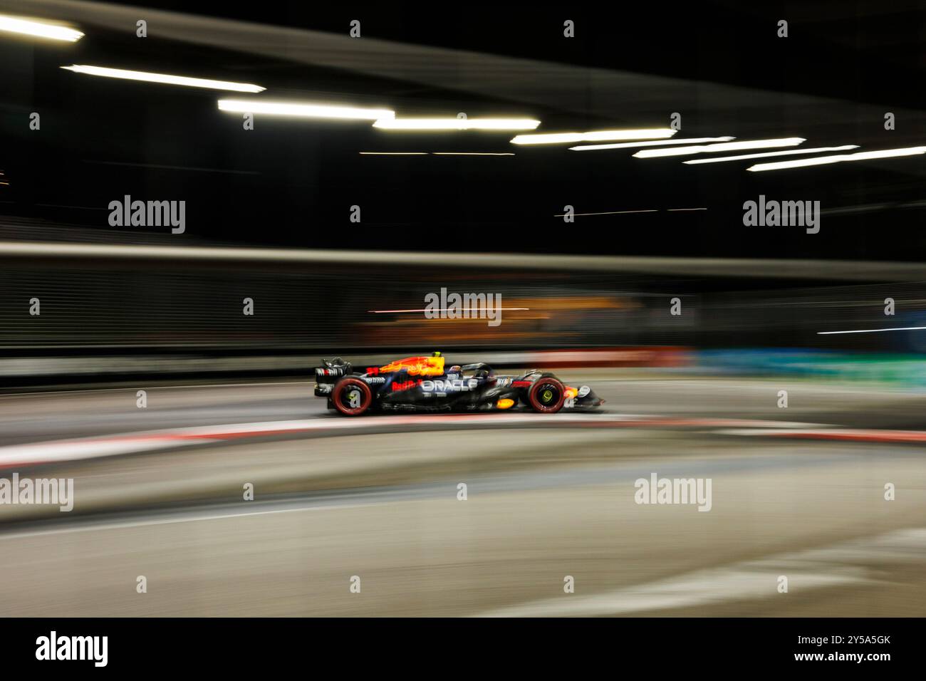 Singapore, Singapore. 20th Sep, 2024. Sergio Perez of Mexico drives the (11) Oracle Red Bull ...