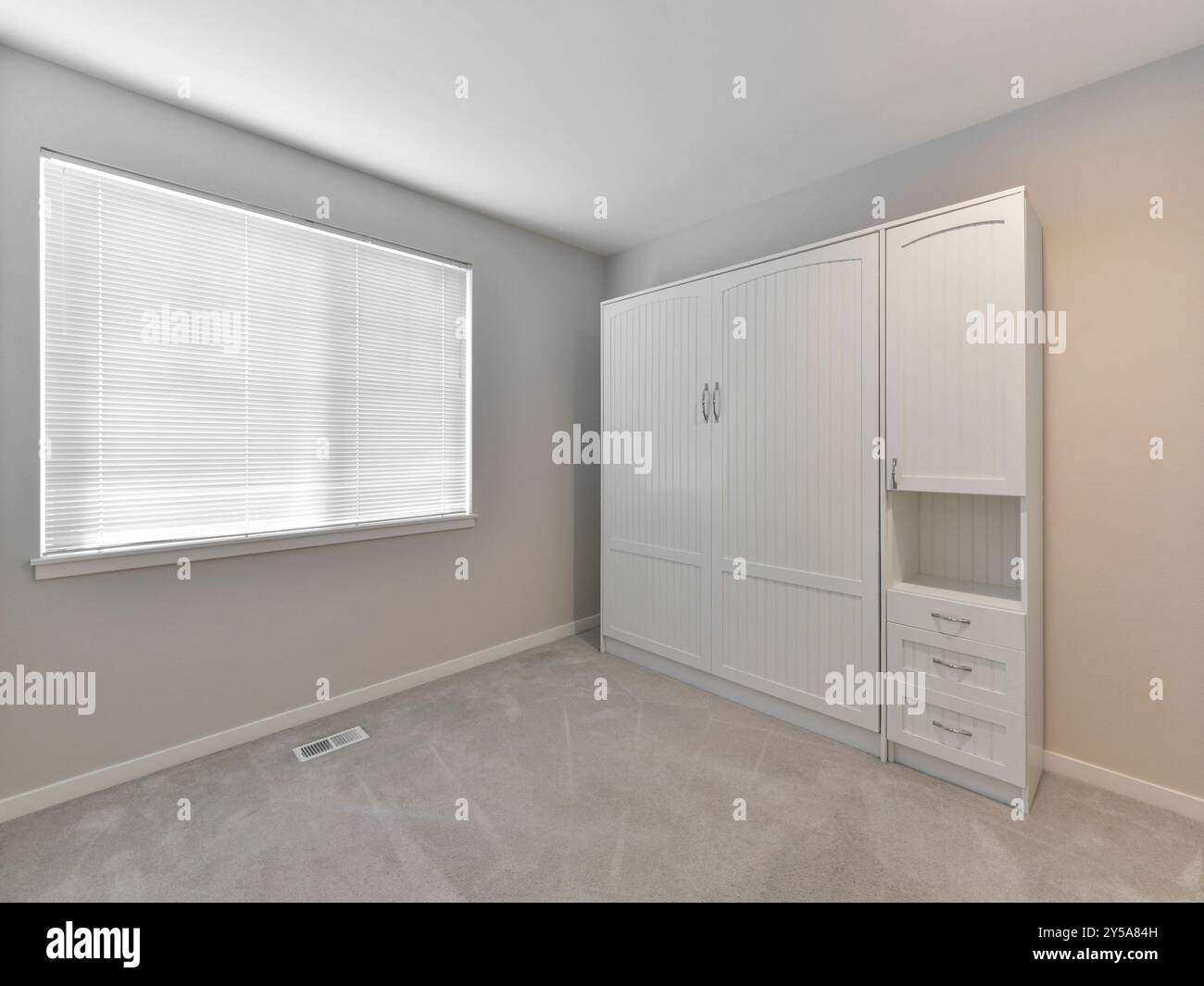 Modern residential empty bedroom interior Stock Photo - Alamy
