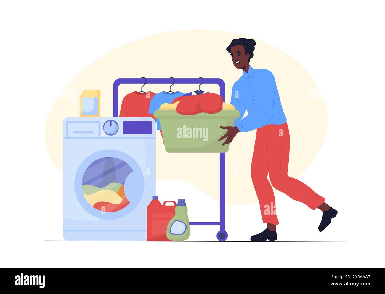 Man washing clothes. Young guy with basin of dirty clothes in laundry ...