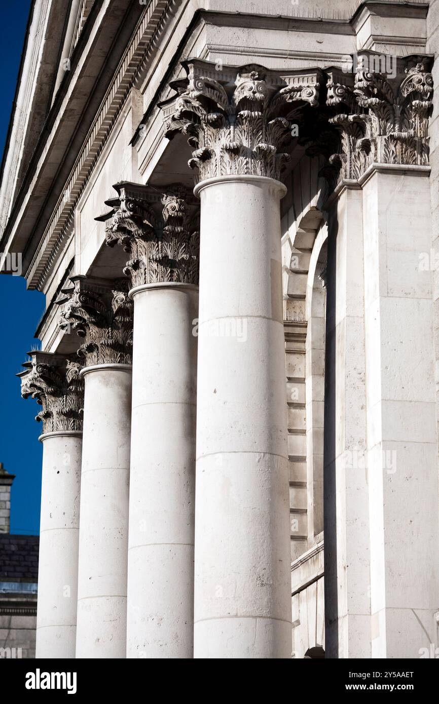 The elegant neoclassical columns of Trinity College showcase intricate ...