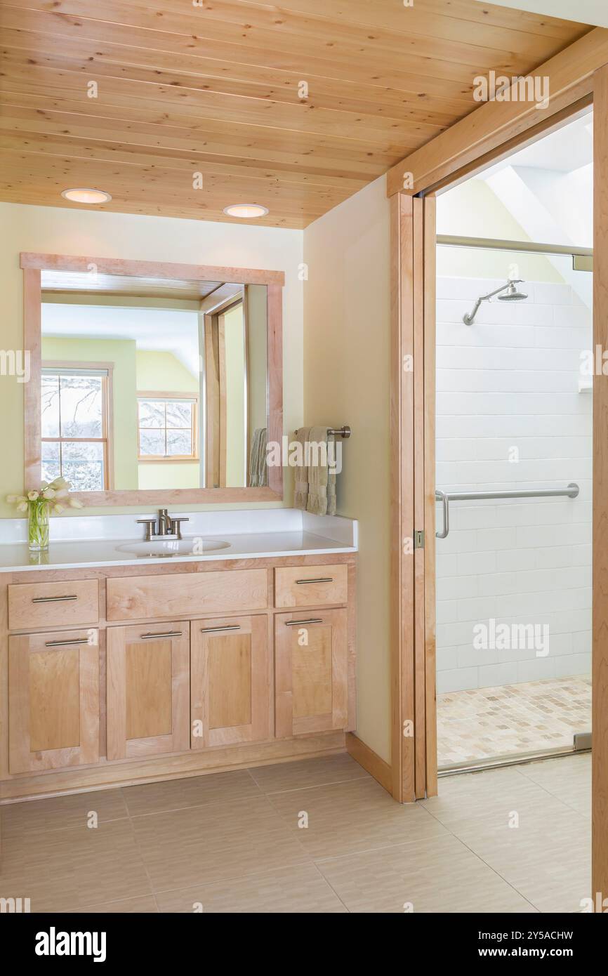 Bathroom with maple wood ceiling and pitched roof in shower Stock Photo ...