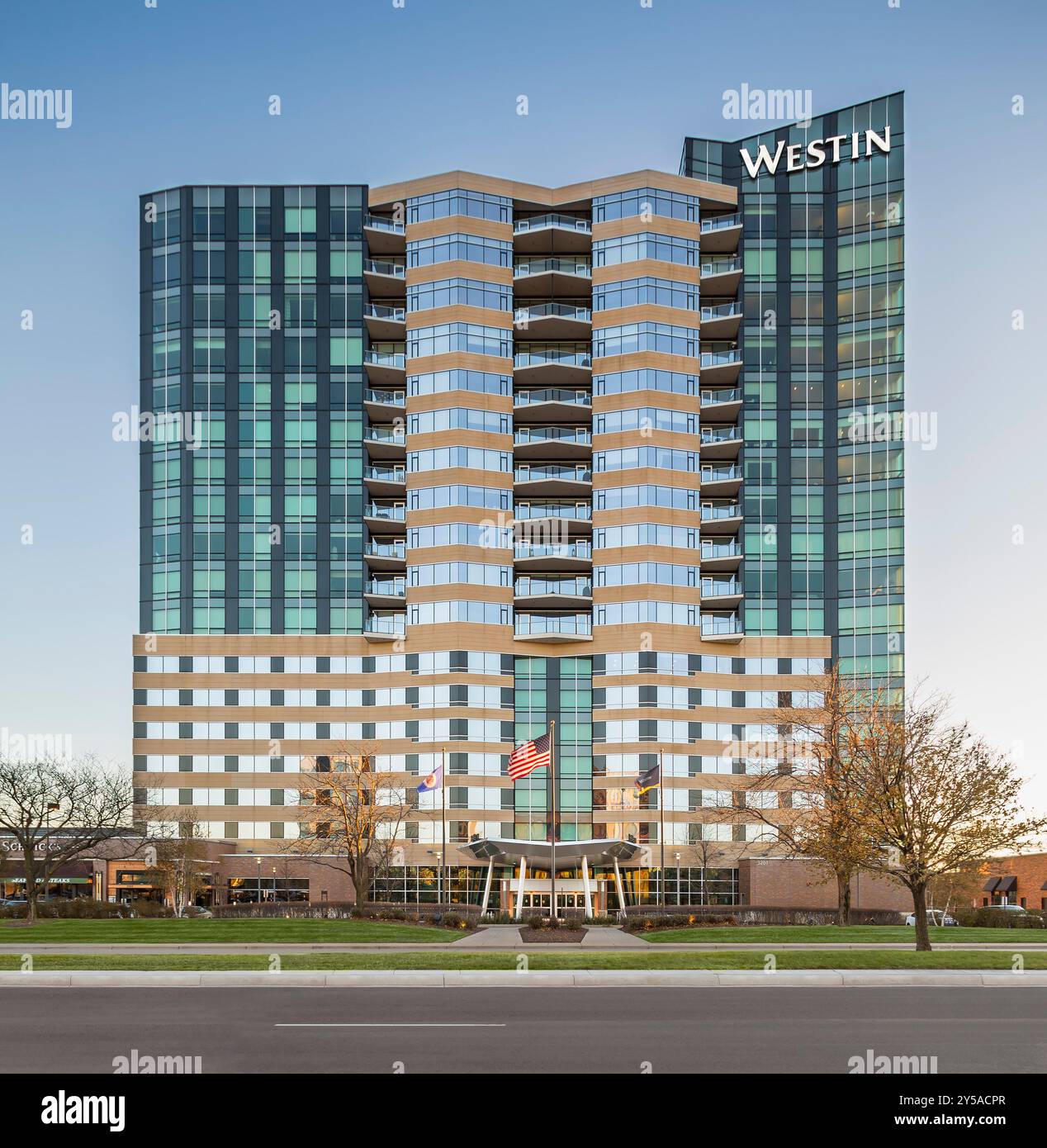 Front exterior of large hotel with lots of glass and windows Stock ...