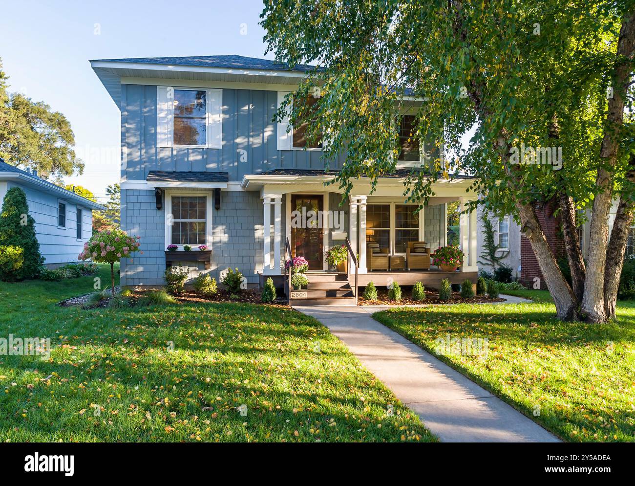Front yard of gray house with both vertical siding and shingle siding ...