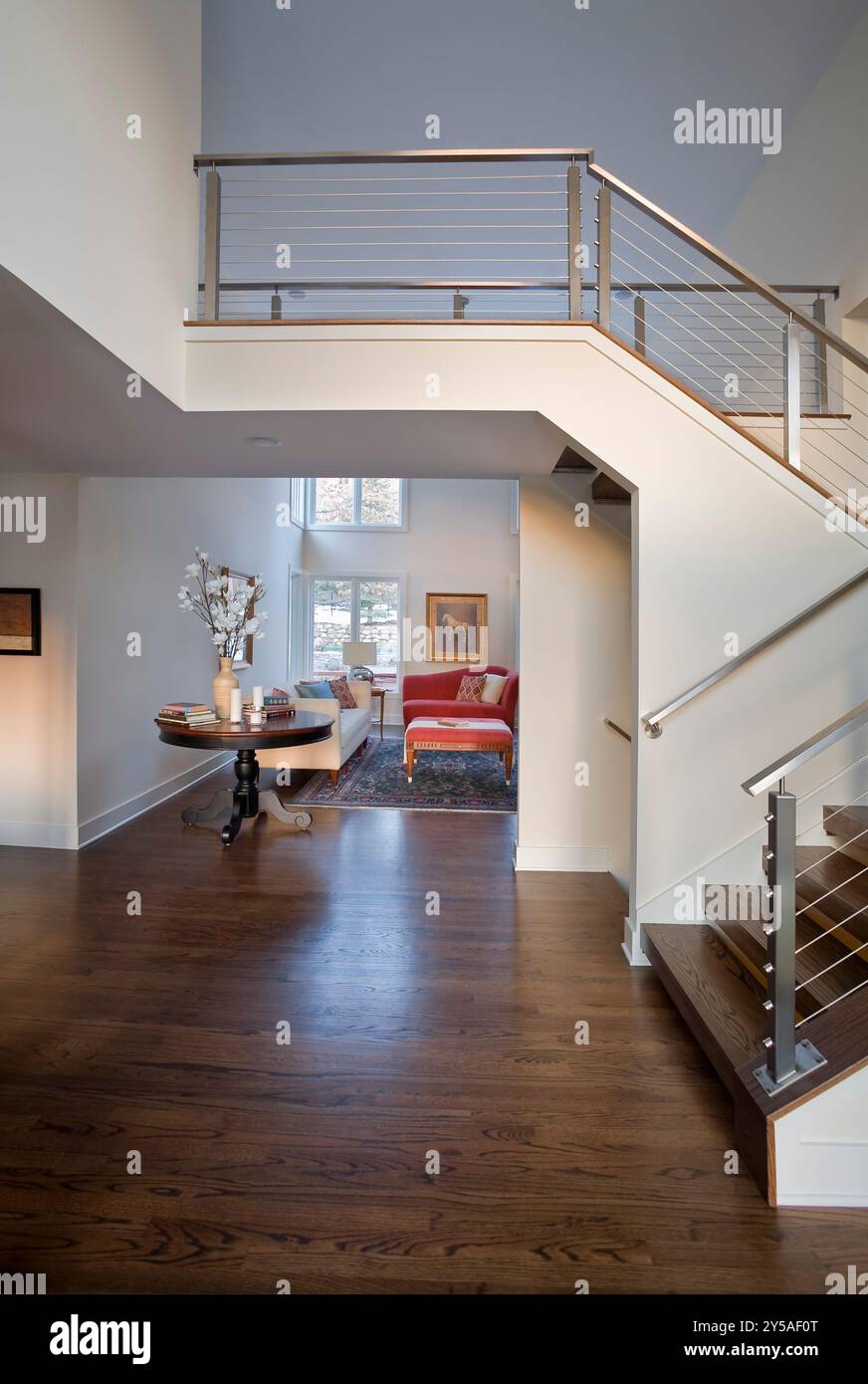 Stairway connects to bridge and rest of second floor hi-res stock photography and images - Alamy