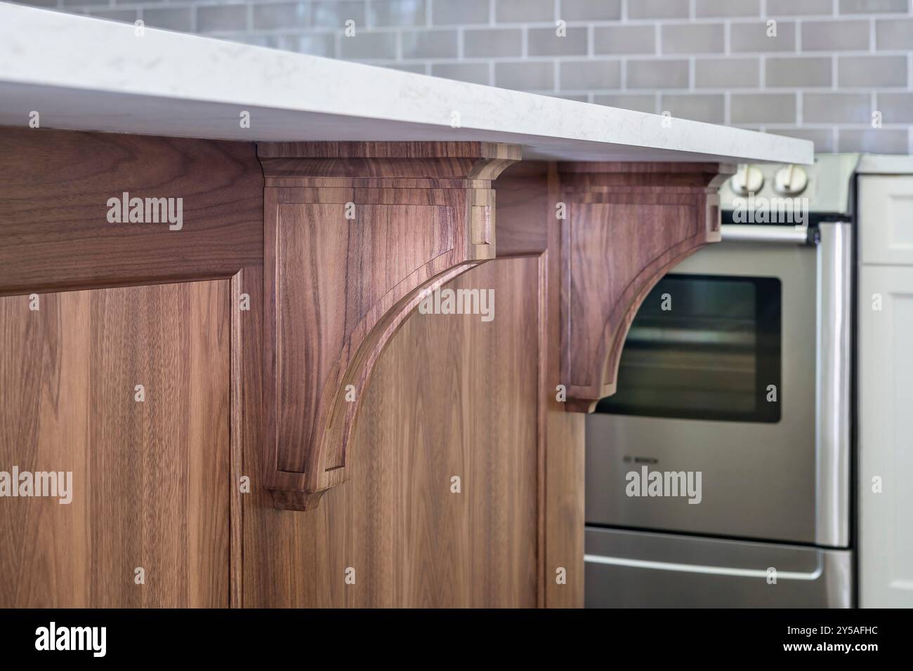 Close up of wood brackets on kitchen island Stock Photo - Alamy