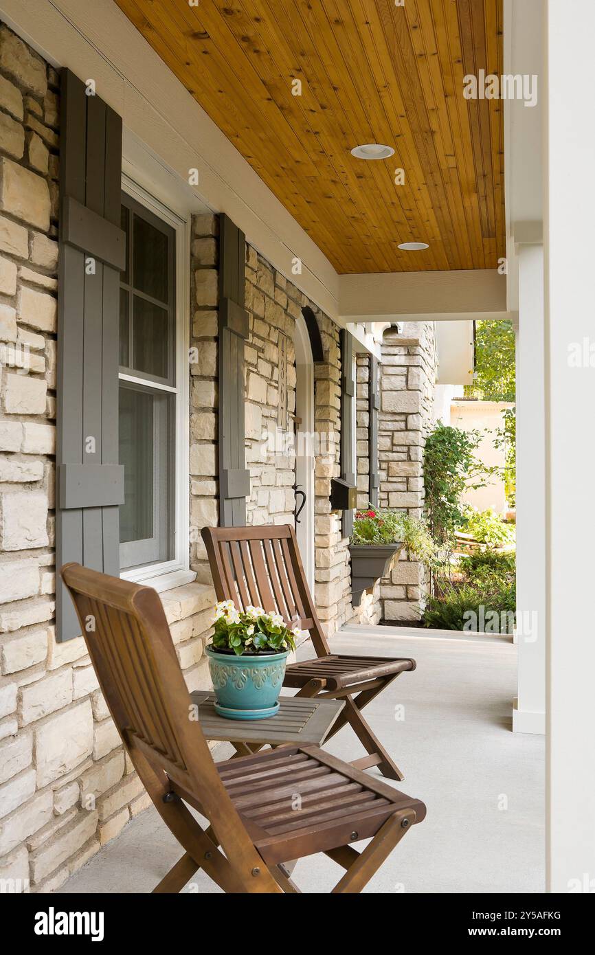 View of interior of pretty front porch showing stained wood ceiling ...
