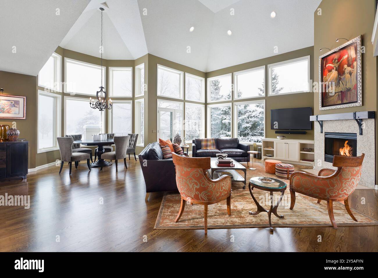 Large living room with colorful features, pitched ceiling and ...