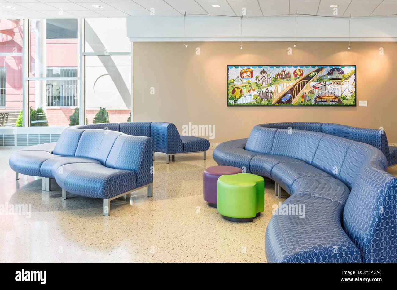 Lobby of children's hospital with large tile wall mosaic and modern ...
