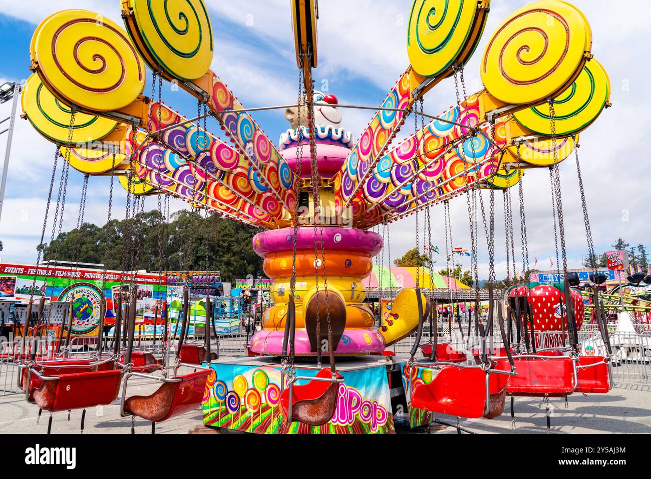 Kids swing ride at the County Fair Stock Photo - Alamy
