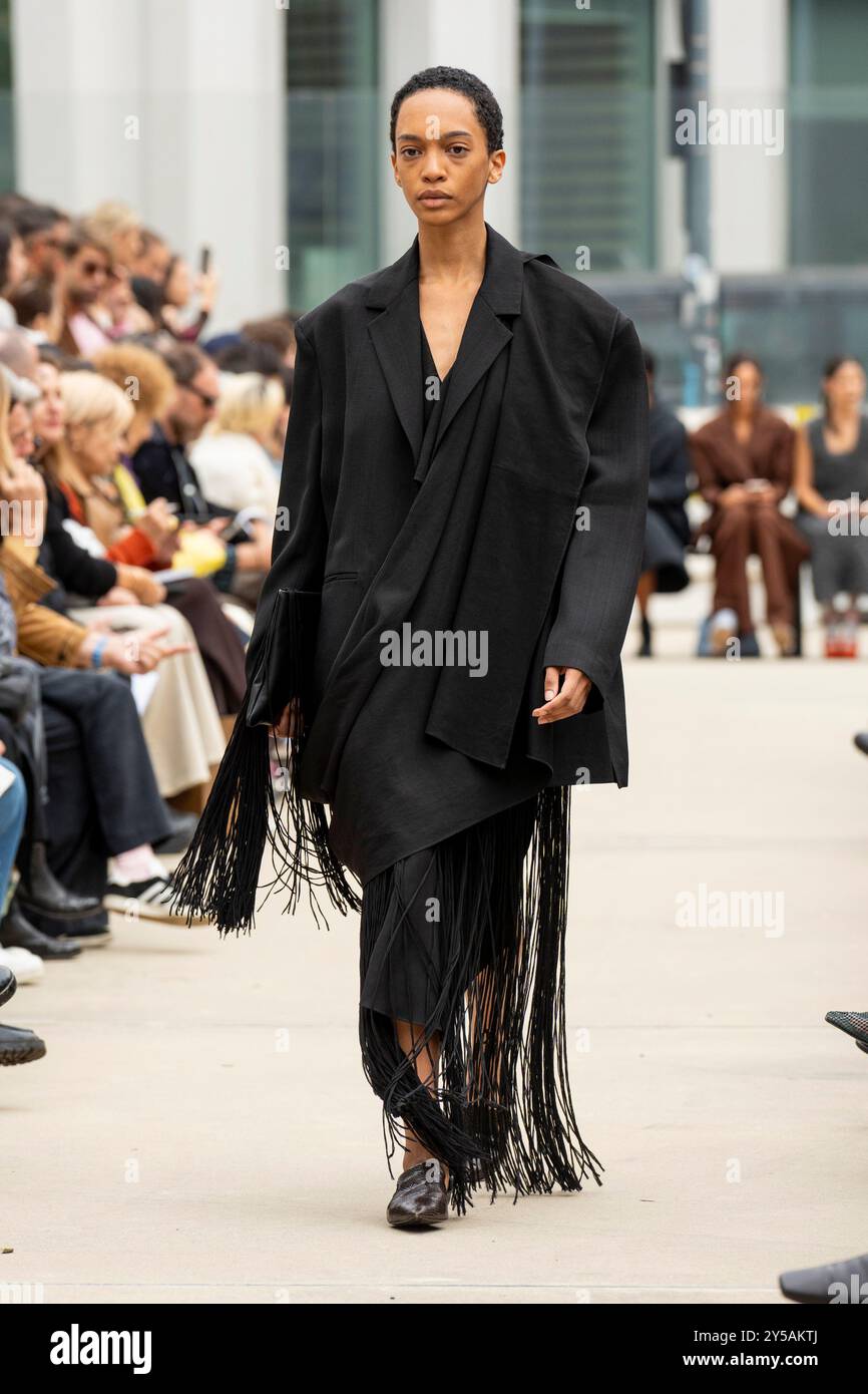 Milan, Italy. 20th Sep, 2024. A model walks the runway at the ...