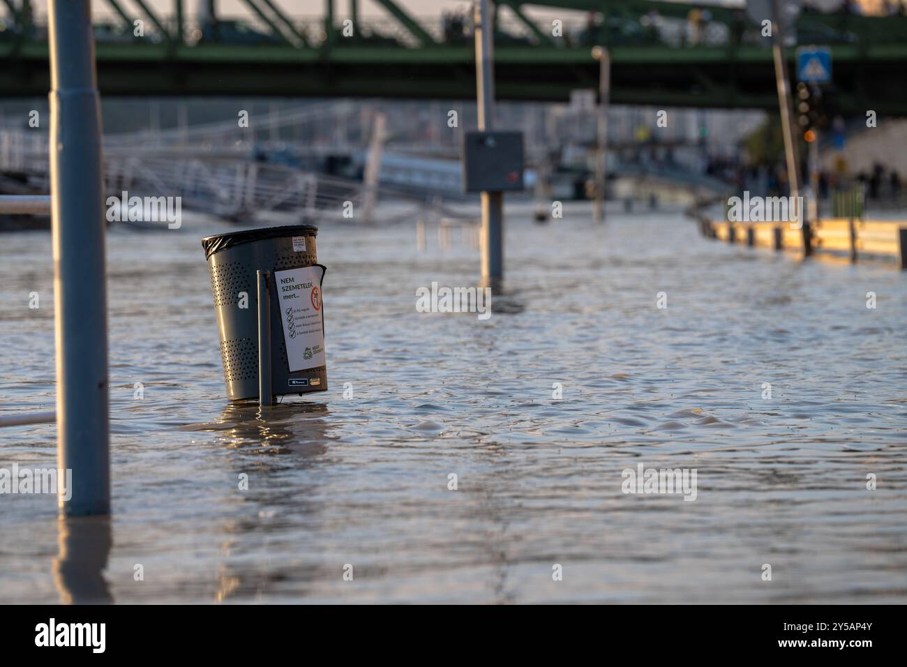 Budapest, Hungary - September 18, 2024: A Trash Bin Stands Submerged in ...
