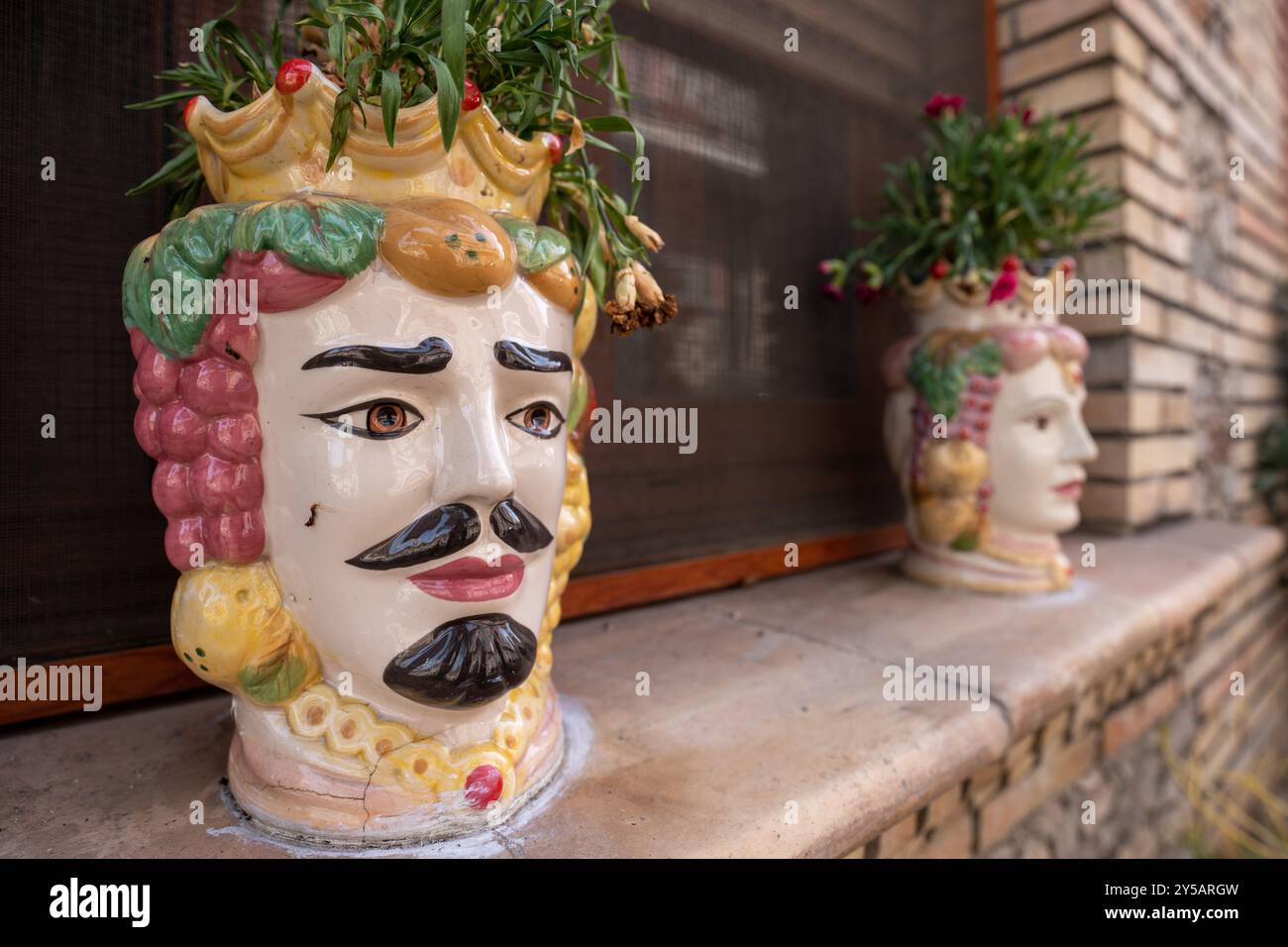 Taormina, Italy - June 19, 2024: Traditional Sicilian moorish heads ...