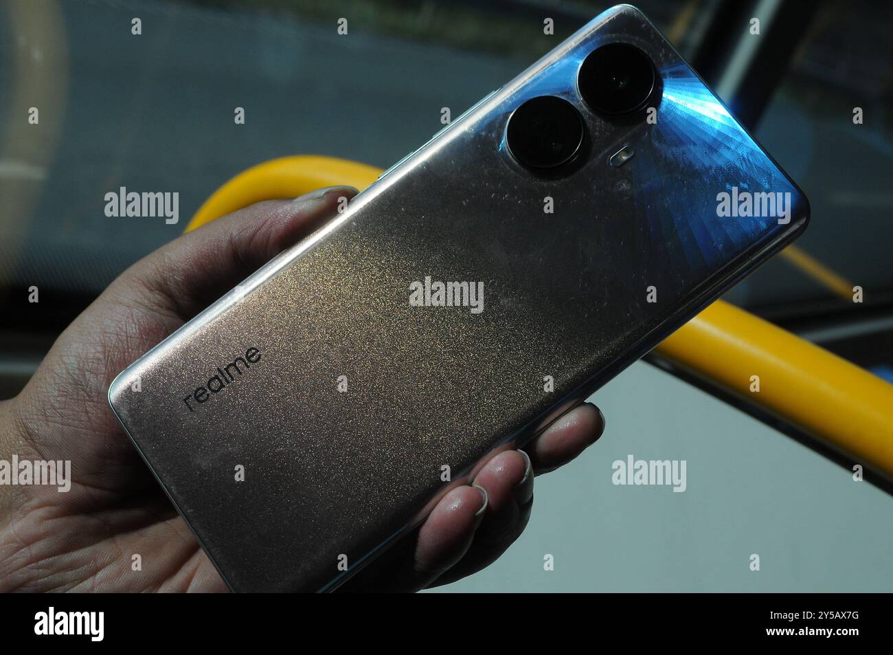 Copenhagen/ DenmarK/17 september 2024/ Asian male with realme cellphone ...