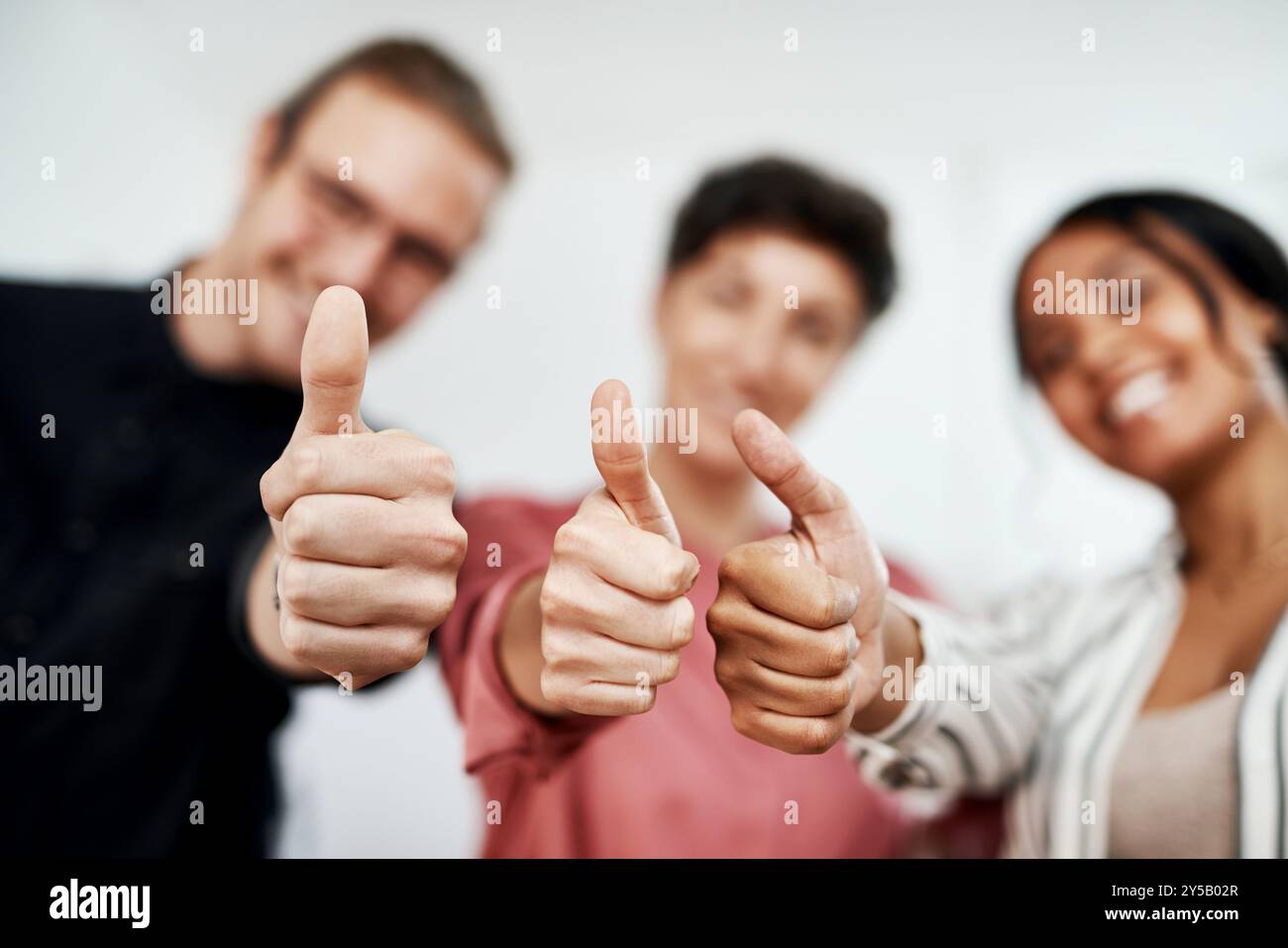 Business people, hands and teamwork with thumbs up for winning, thank ...