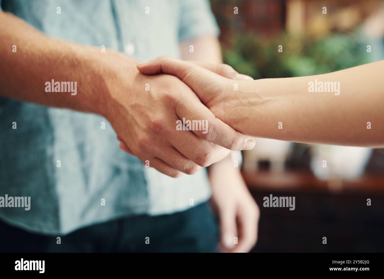 Creative, people and handshake with meeting success for florist ...