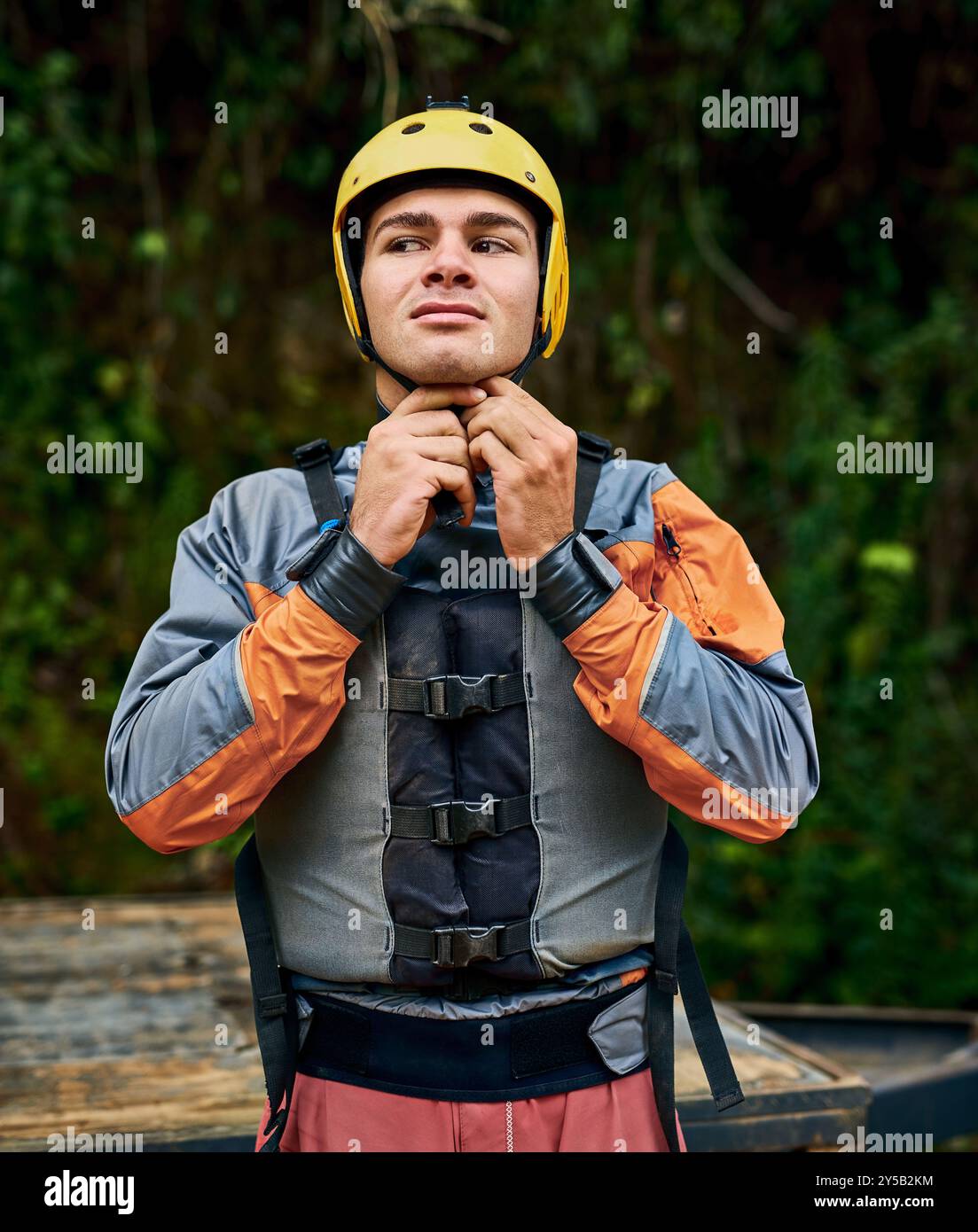 Outdoor, man and safety with helmet for rafting, challenge and ...