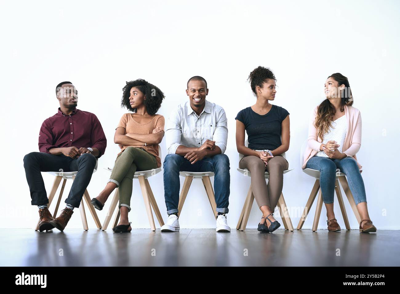 Waiting room, business people and candidates with talking for interview ...