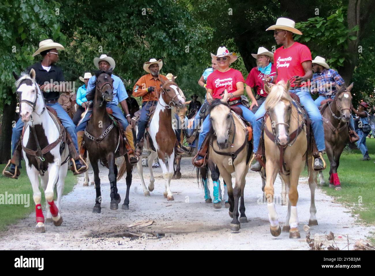 Cowboys, cowgirls and their horses begin their 7.5 mile (12 kilometers ...