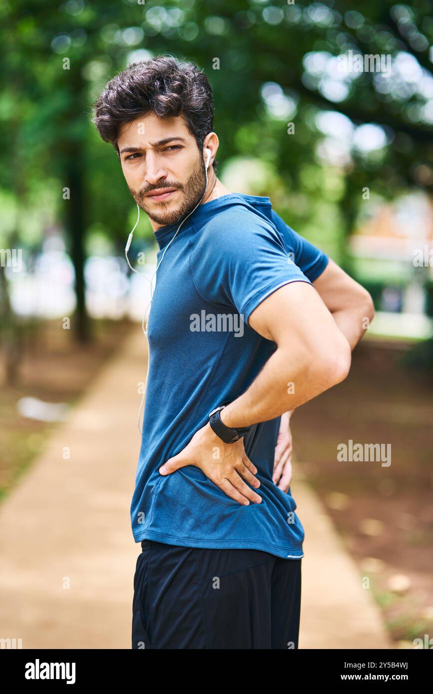 Fitness, man and runner outdoor with back pain of exercise injury ...